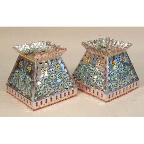 A GROUP OF MEXICAN STAMPED TIN LIGHTING FIXTURES