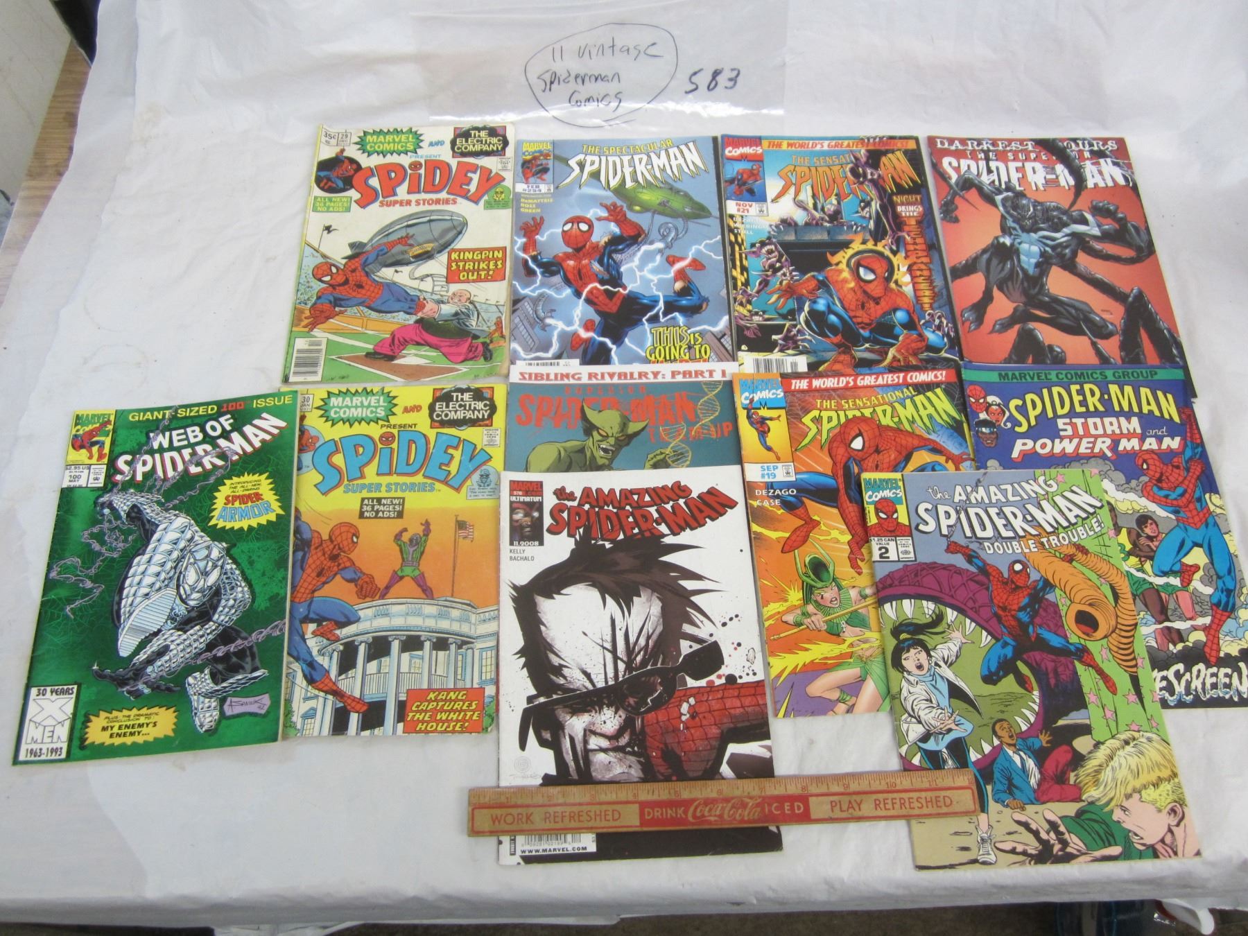 11 Vintage Spiderman Comics - Schmalz Auctions