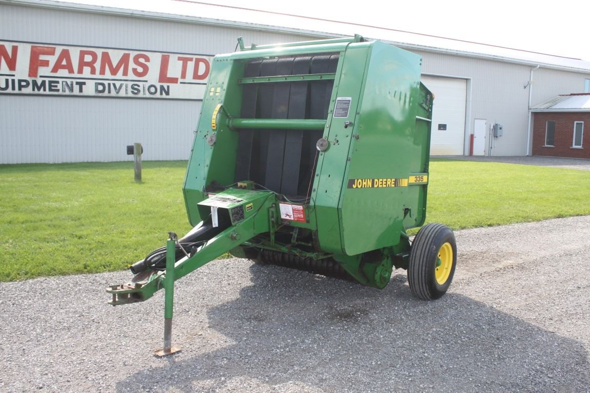 JD 335 4x4 round baler, ramp, hydraulic tie, double twine arm