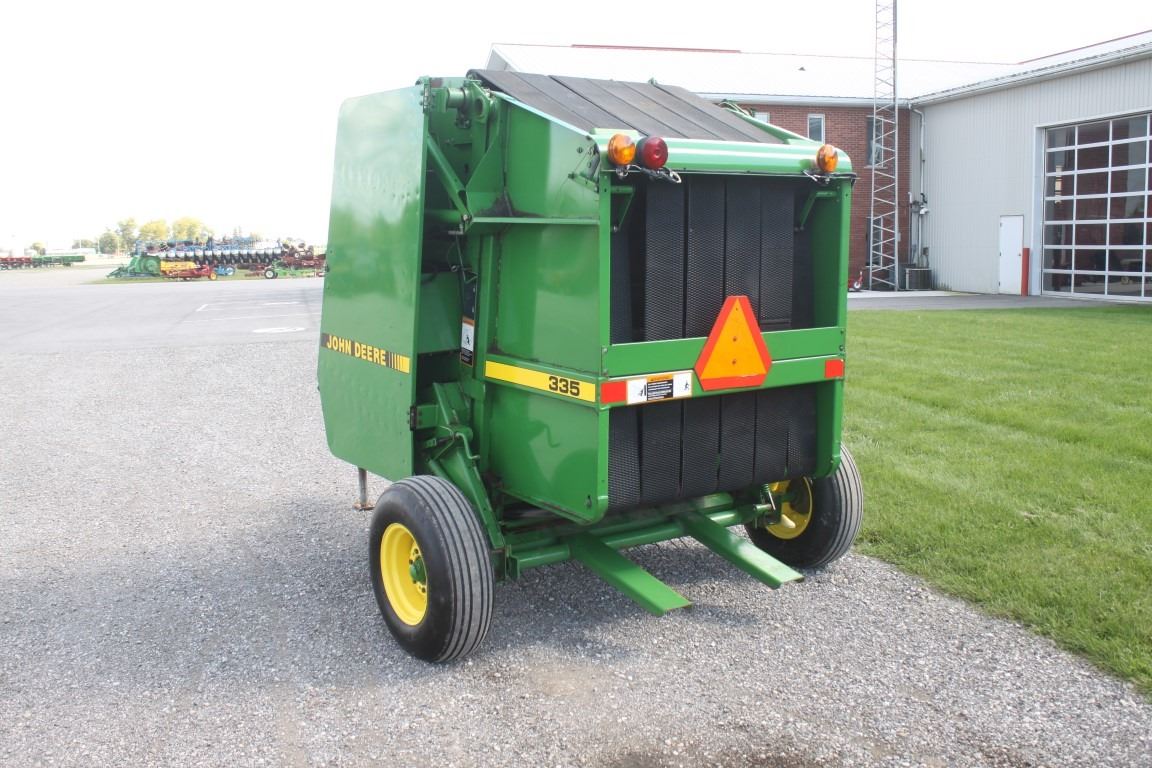 JD 335 4x4 round baler, ramp, hydraulic tie, double twine arm
