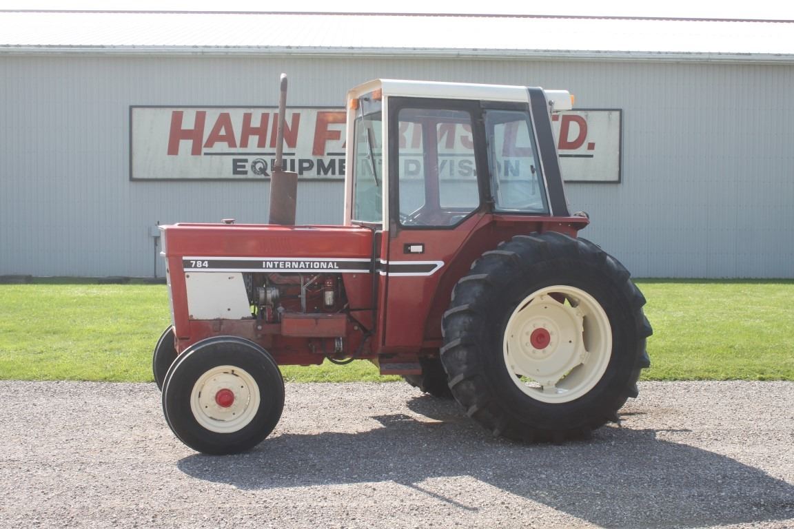 IH 784 2wd tractor, cab, 3pth, 18.4x30, 1299 hours showing, 1 remote ...