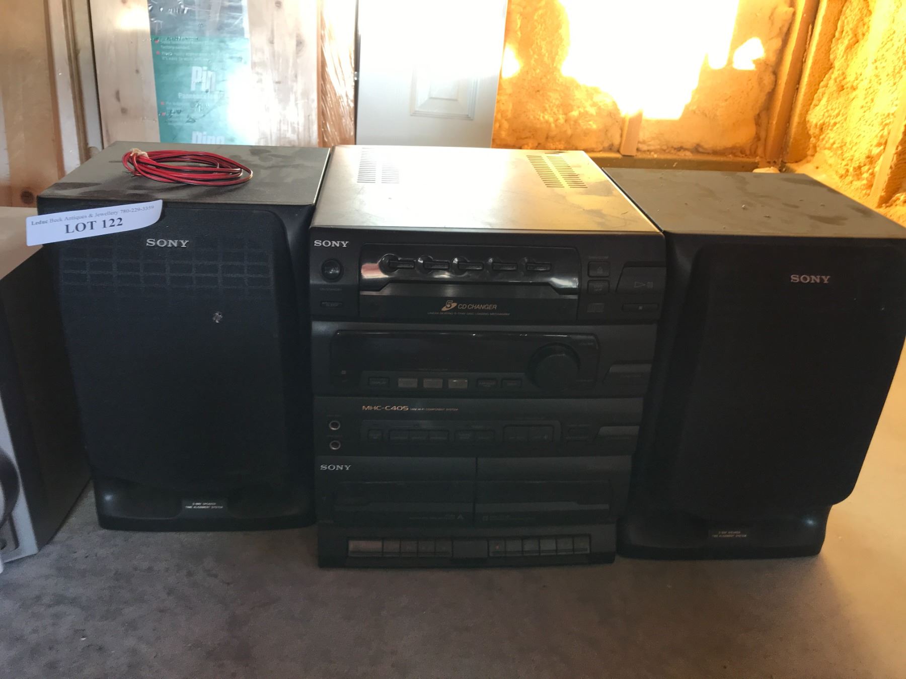Sony stereo system (5-CD changer, dual cassette); Panasonic 5-CD ...