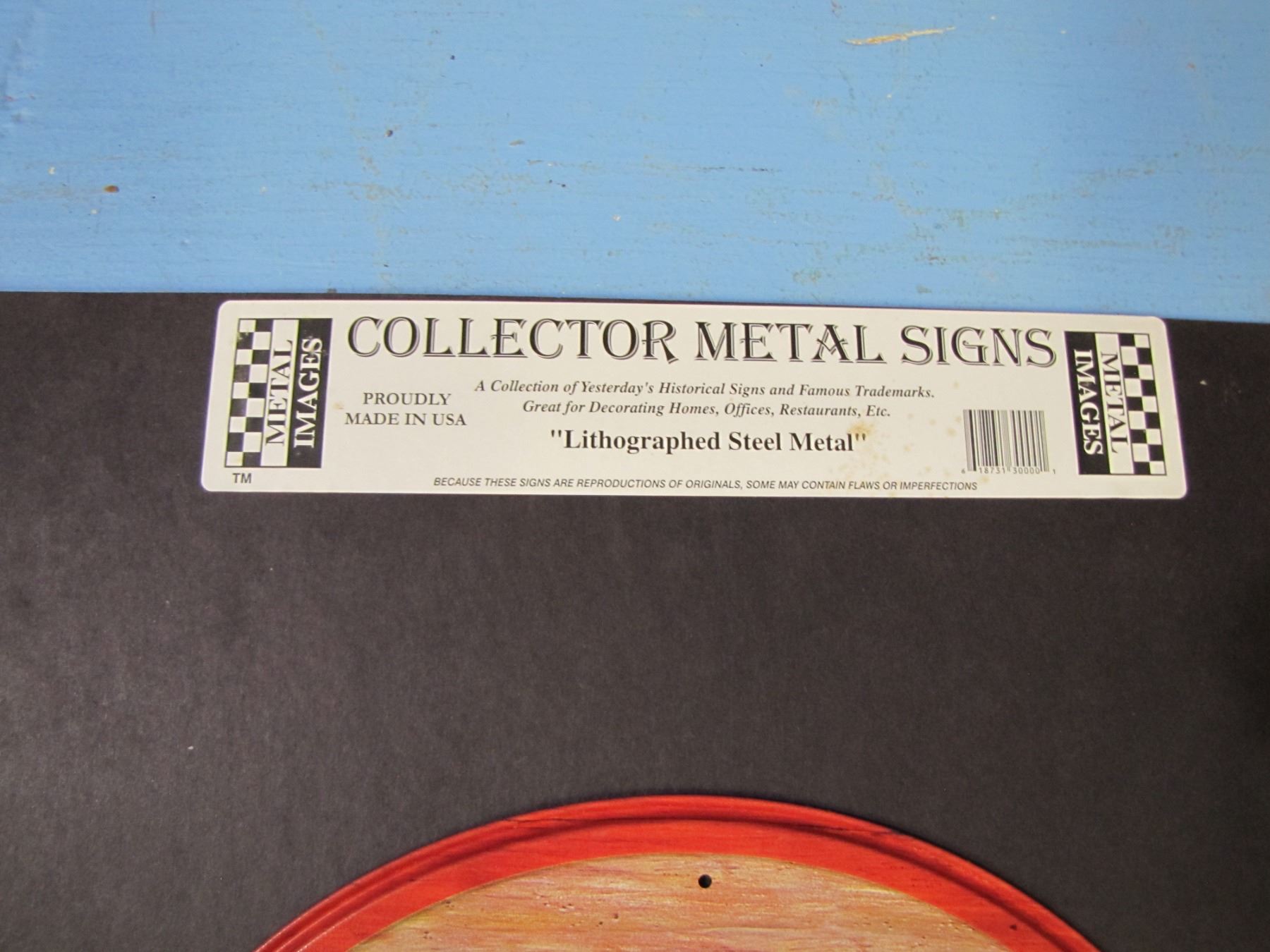 Remington and Winchester collector metal signs