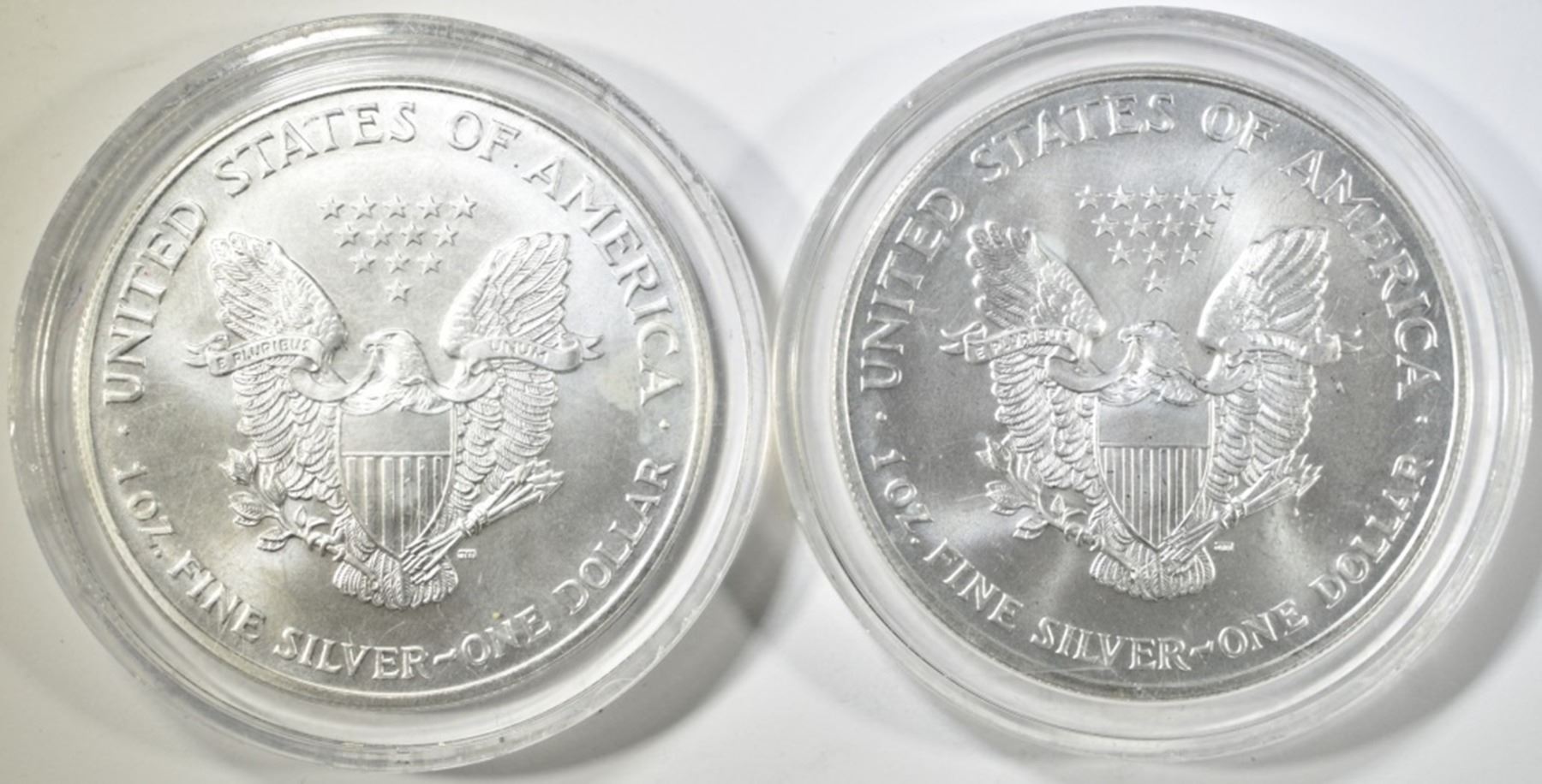 2-1999 COLORIZED SILVER EAGLES IN CAPSULES
