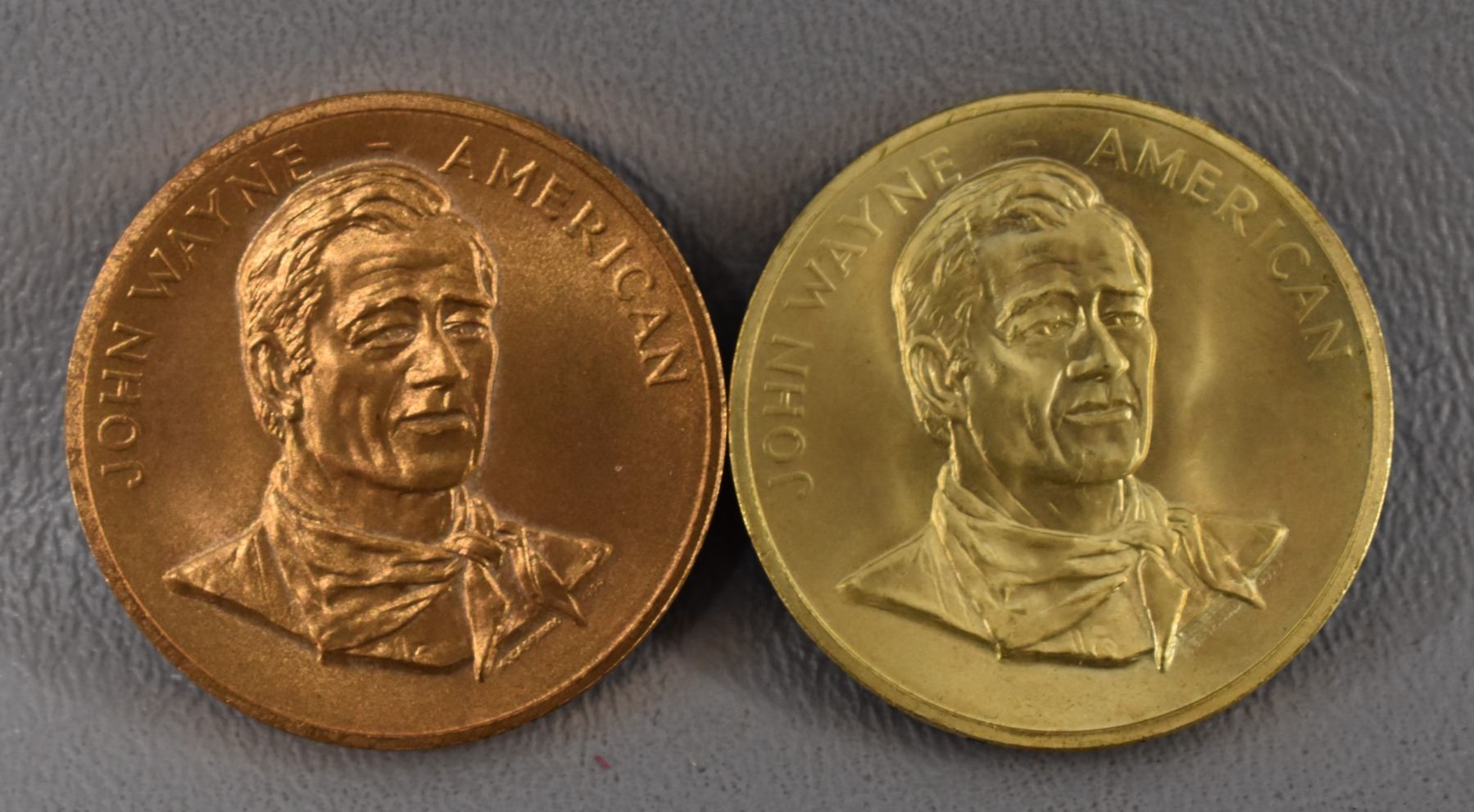 TWO JOHN WAYNE COINS