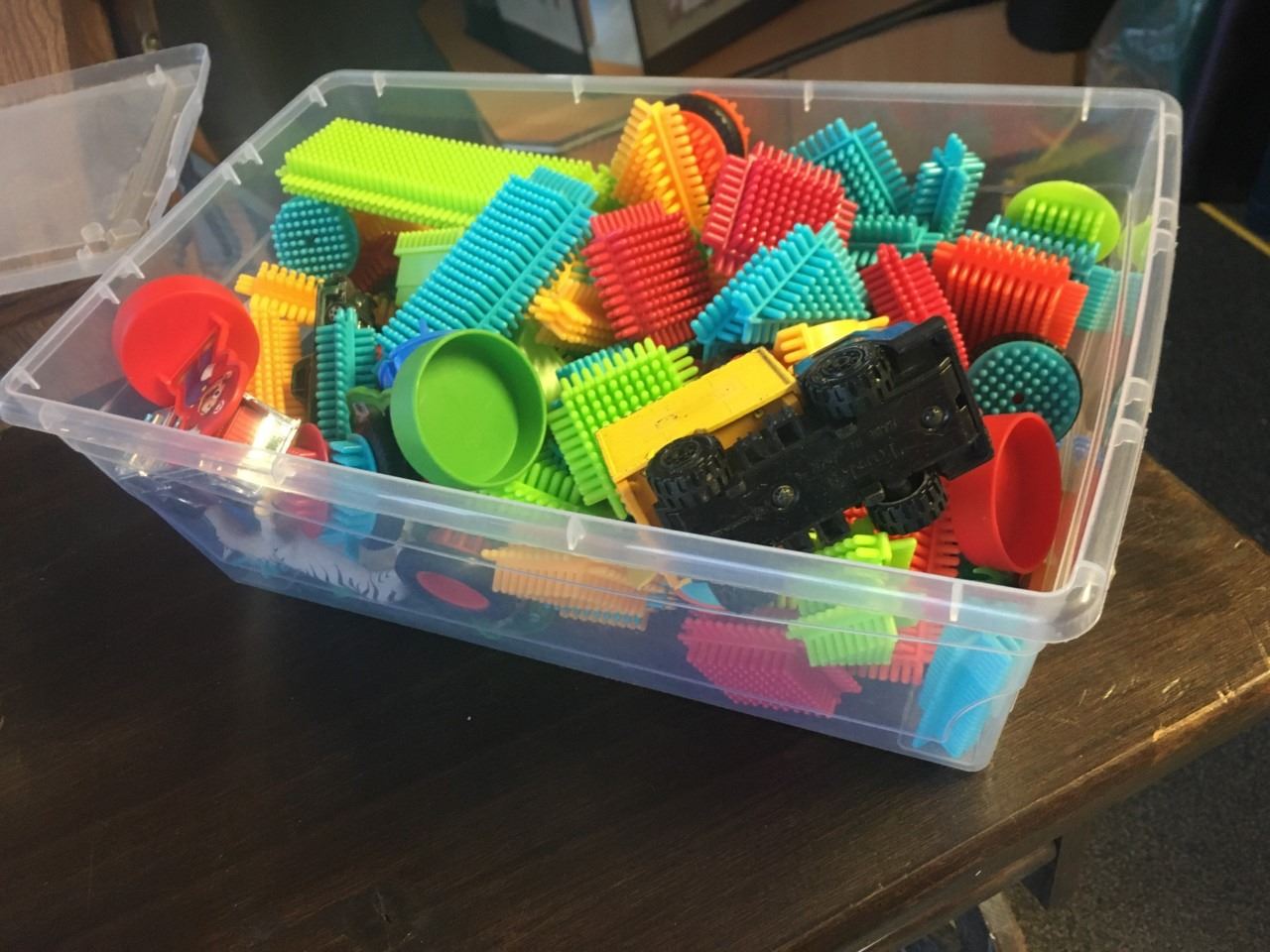 Shoebox Bin of Toys , Bristle Blocks and cars