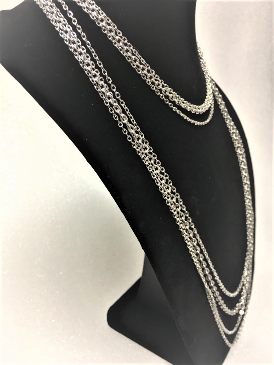 Seven Row Necklace , Seven chains that clasp together in a butterfly ...