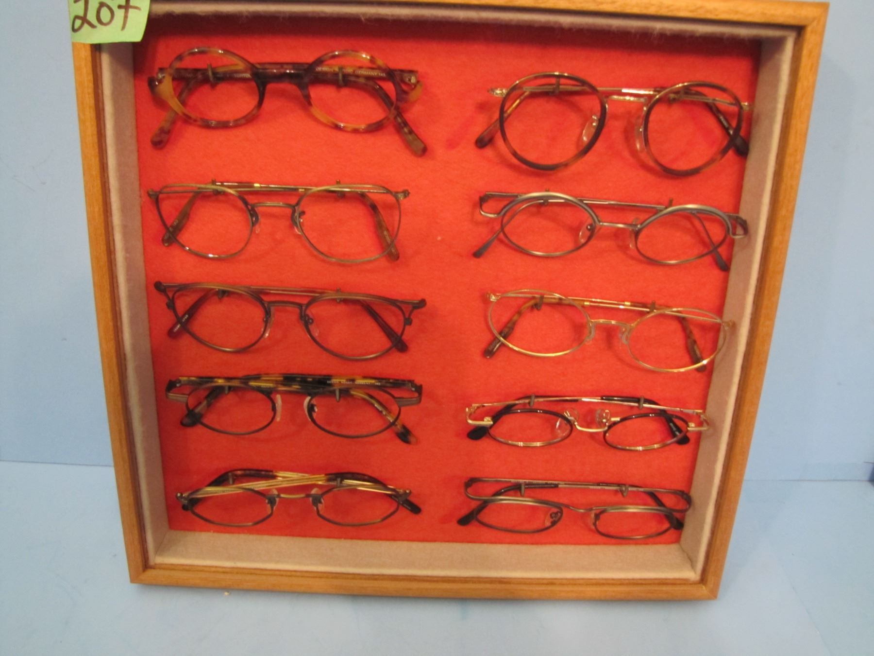 shadow box with eyeglass collection, wall hanging