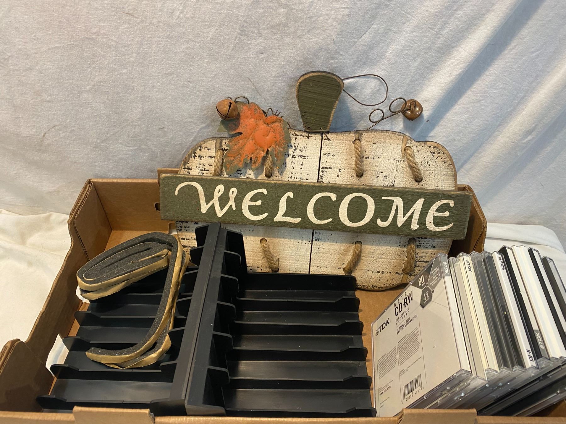 Welcome sign and cd cases