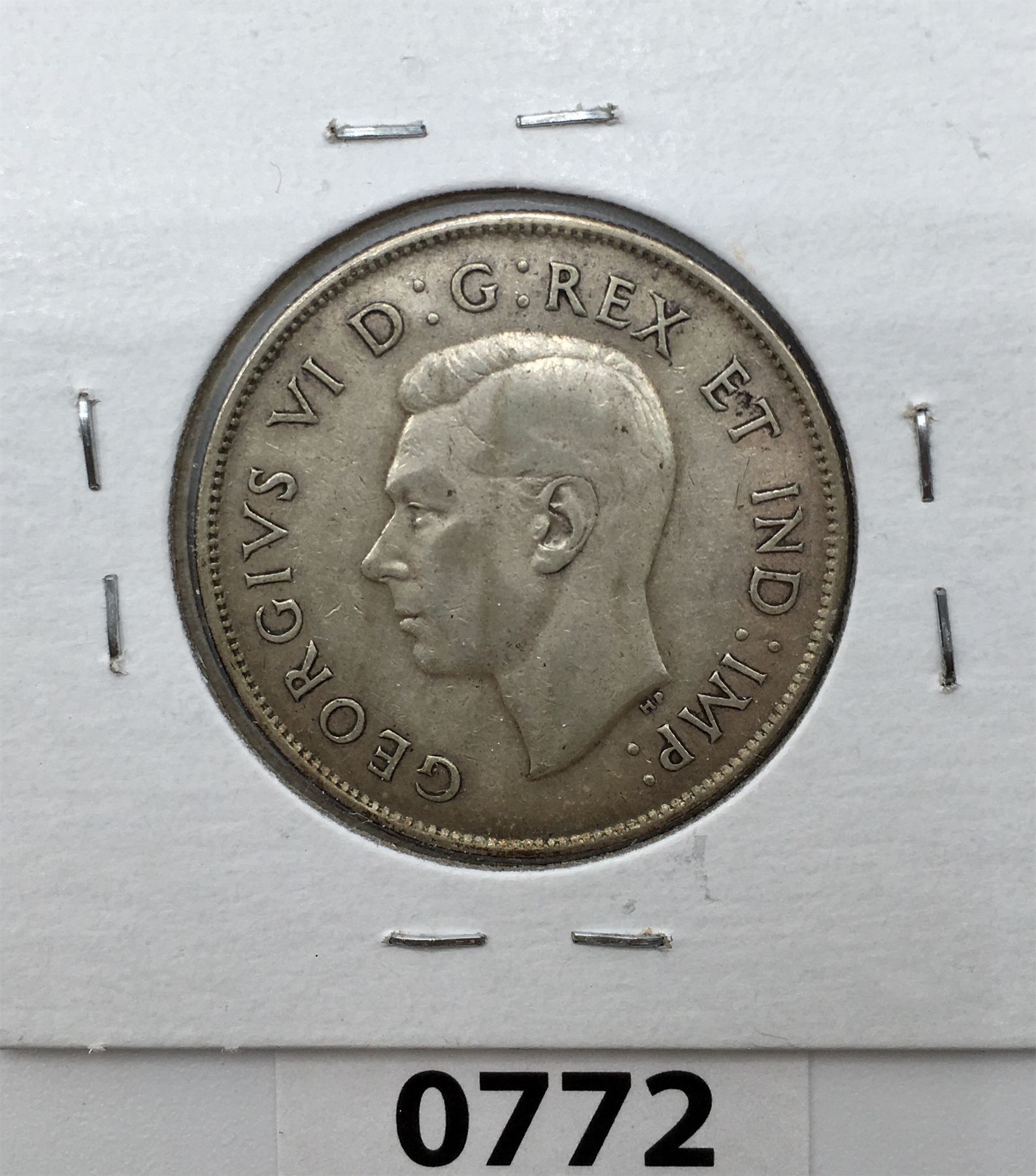 1947 CURVED 7 CANADIAN 50 CENT PIECE Kidd Family Auctions 1947 CURVED 7 CANADIAN 50 CENT PIECE Kidd Family Auctions