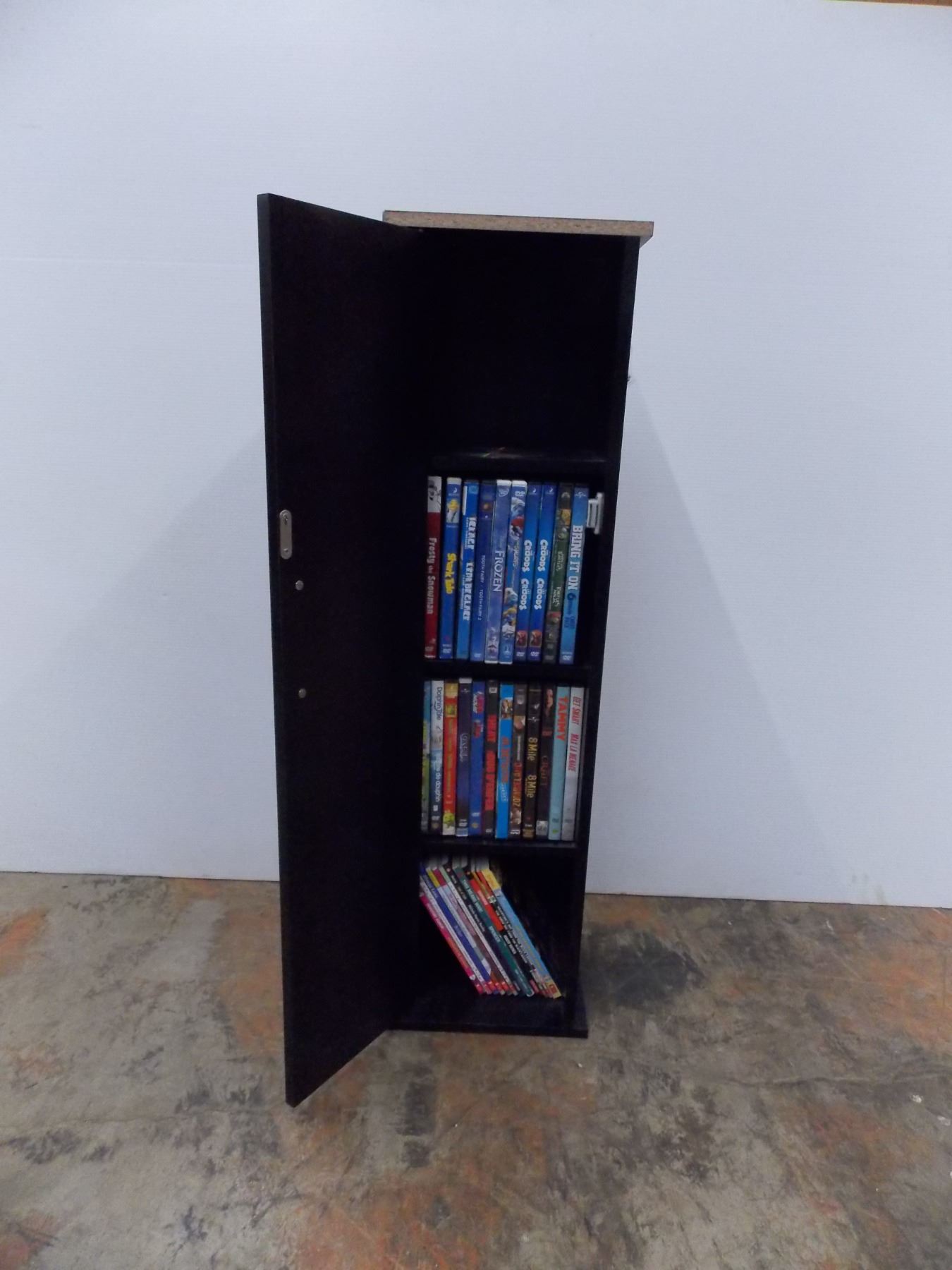 *DVD stand with movies + books inside