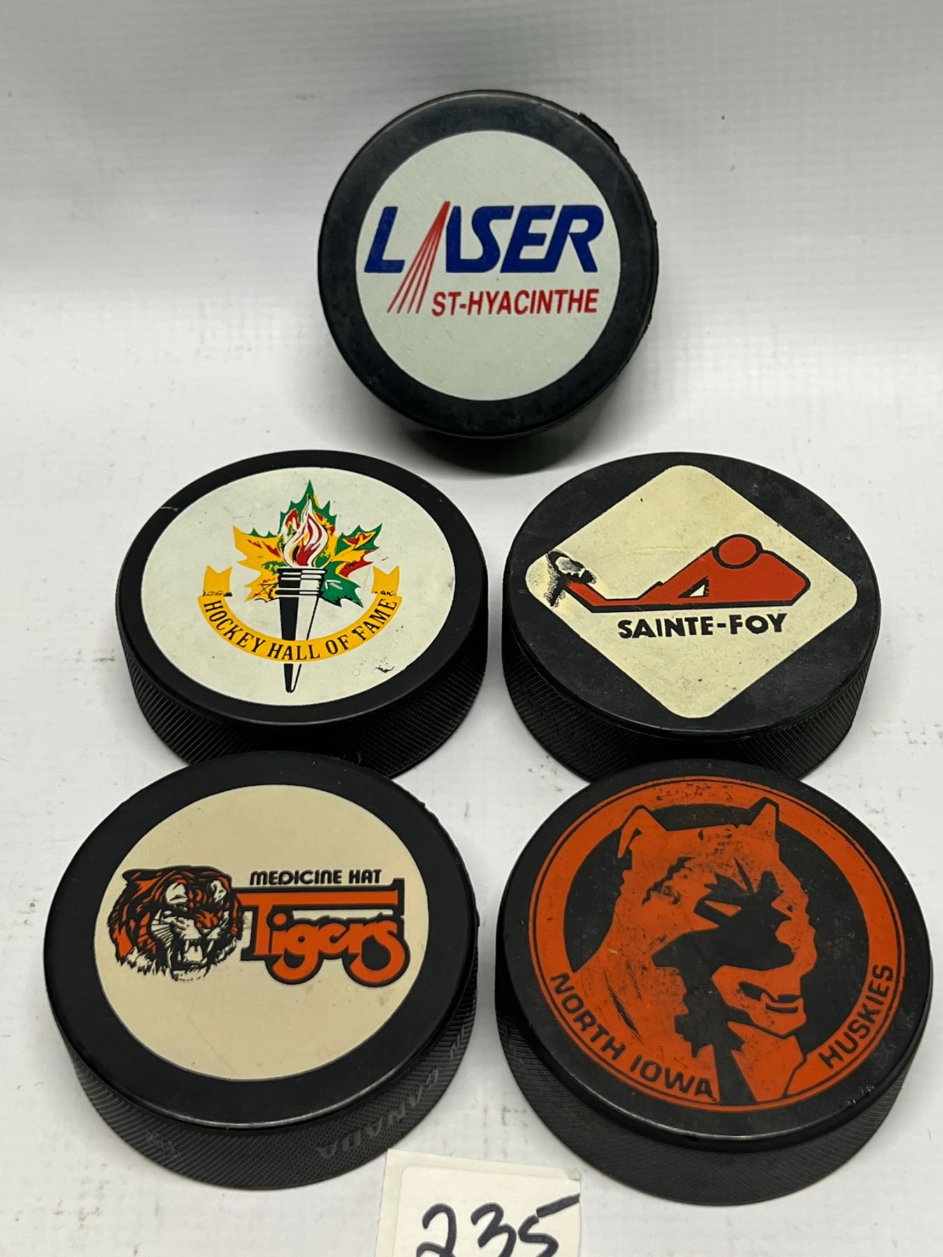 4 Vintage Hockey Pucks North Iowa Huskies Hall of Fame WHL etc