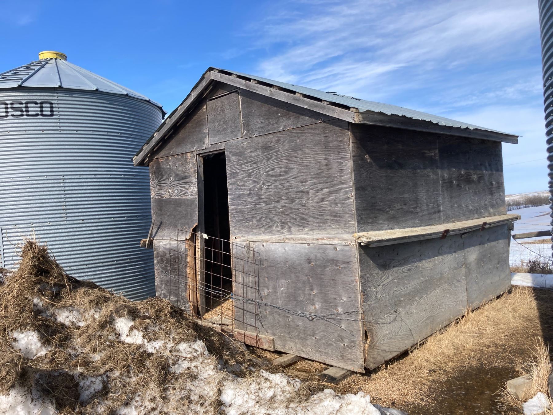 Square Wooden Grainery with Tin Roof