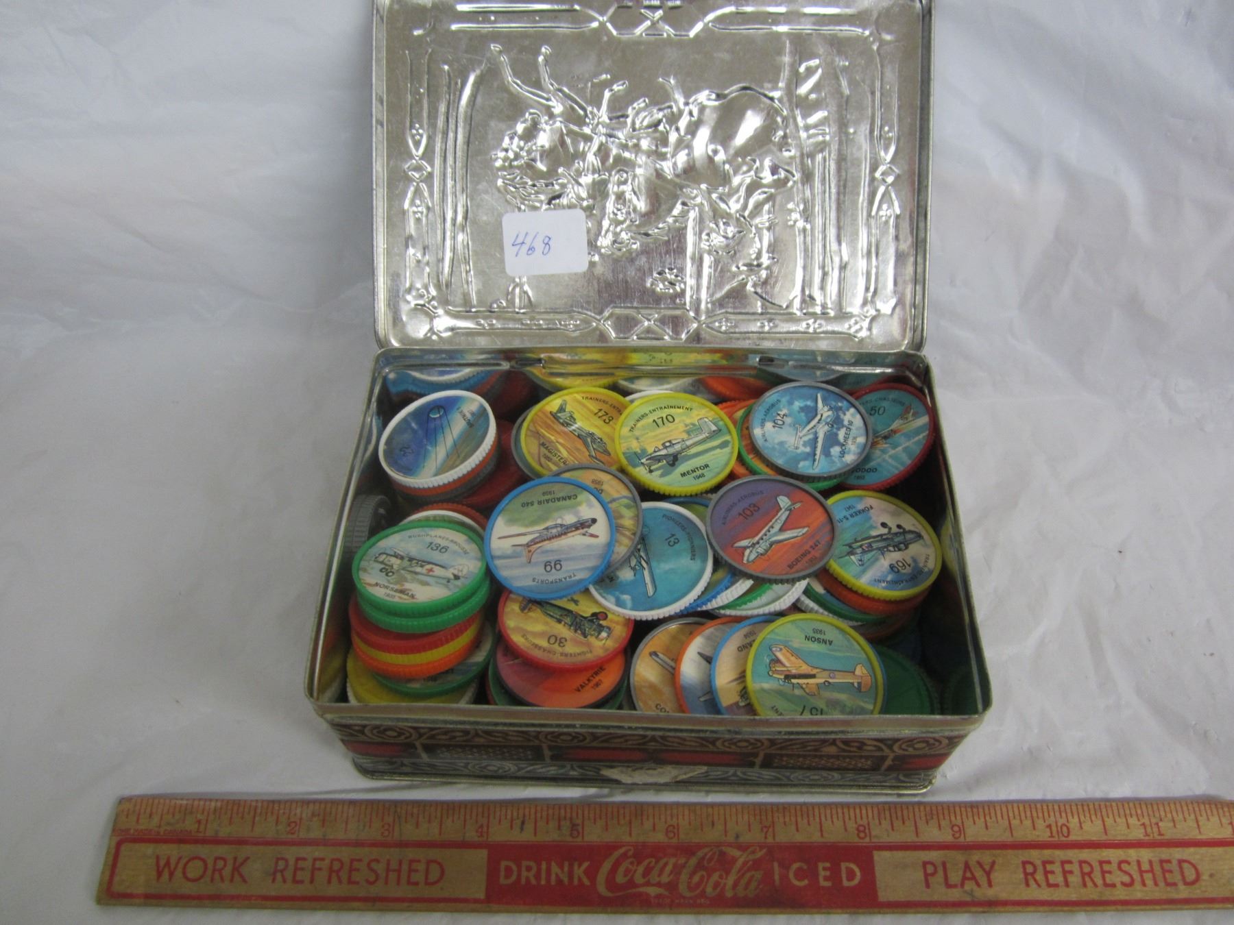 108 Airplane Jello Coins in a Tin - Schmalz Auctions