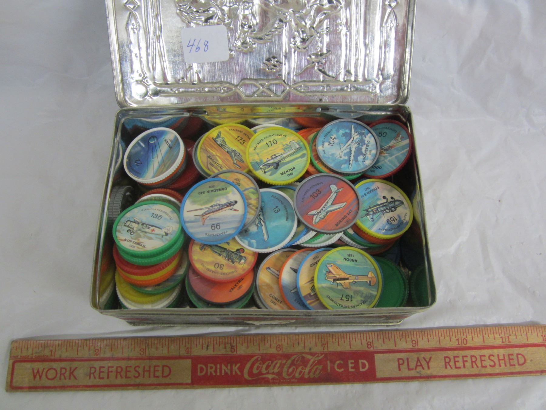 108 Airplane Jello Coins in a Tin - Schmalz Auctions