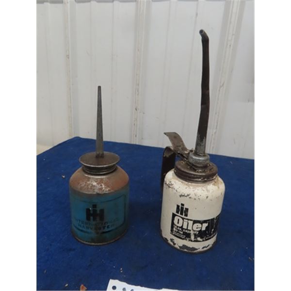 2 International Oil Squirt Cans Mcsherry Auction Service Ltd