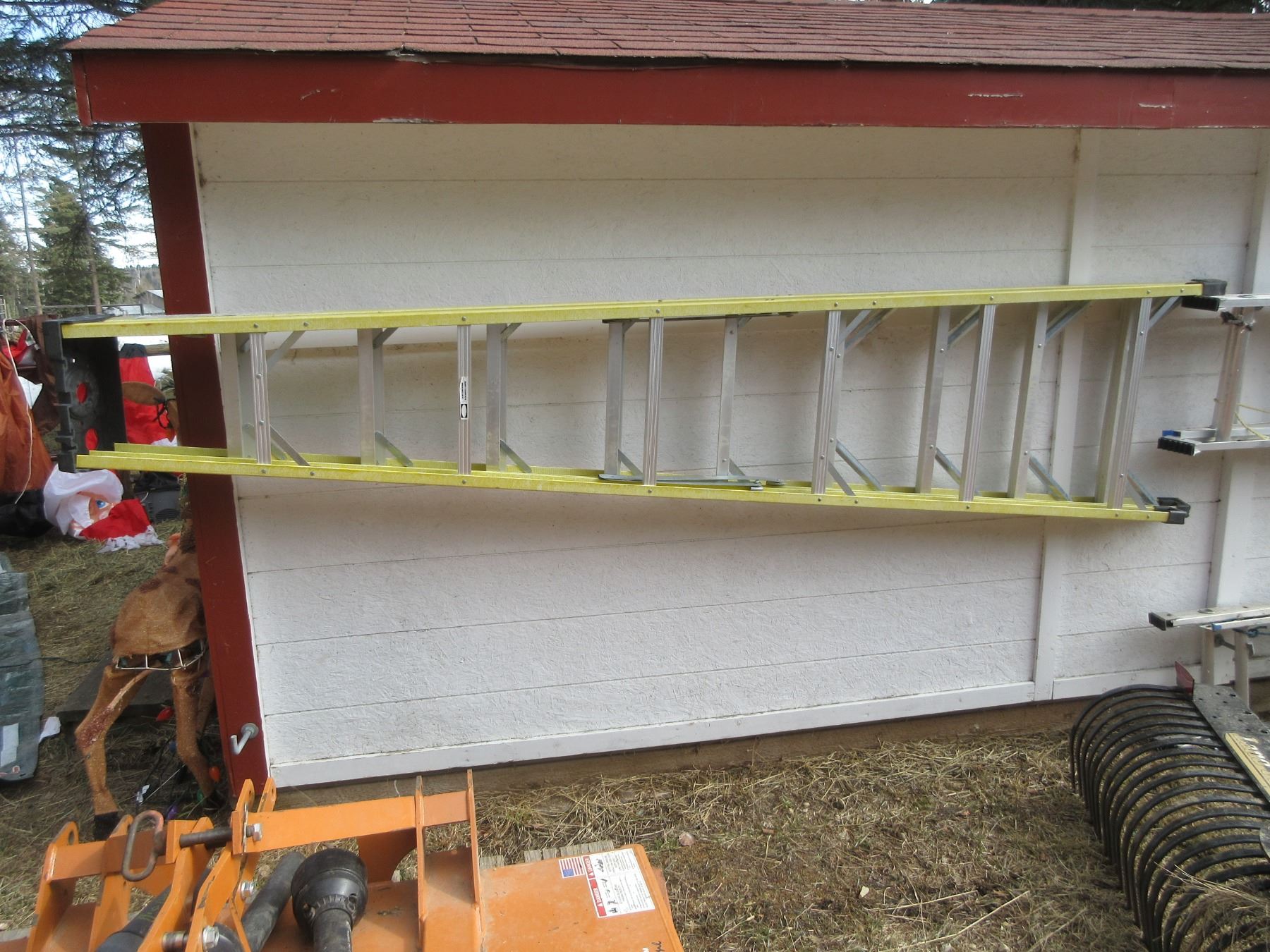 SIDE OF SHED: Approx. 10' Fiberglass Ladder