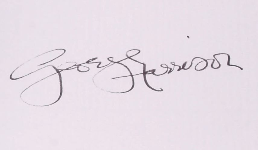 George Harrison Signed album page.