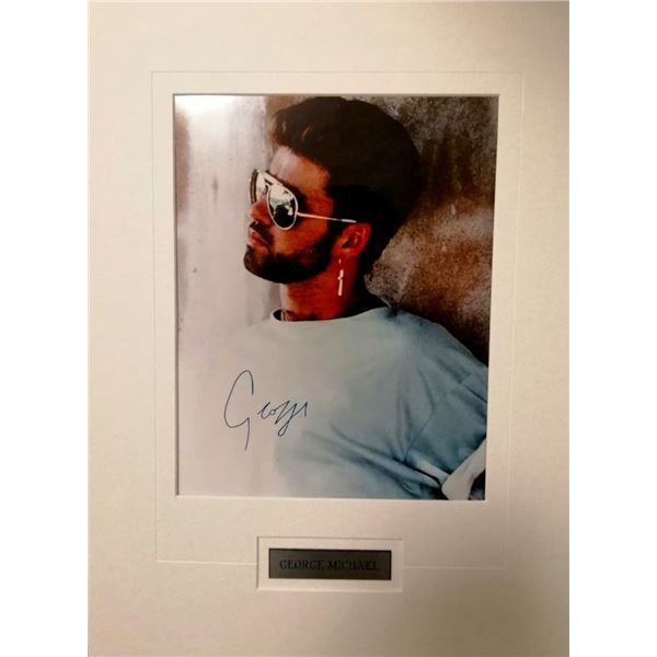 George Michael signed photograph (1963-2016).