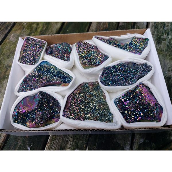 Tray of amethyst celestial cluster crystals.