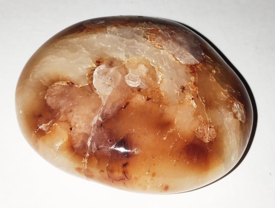 Carnelian stone - 105 grams. 2.25 inches x 2 inches x 0.75 inches.