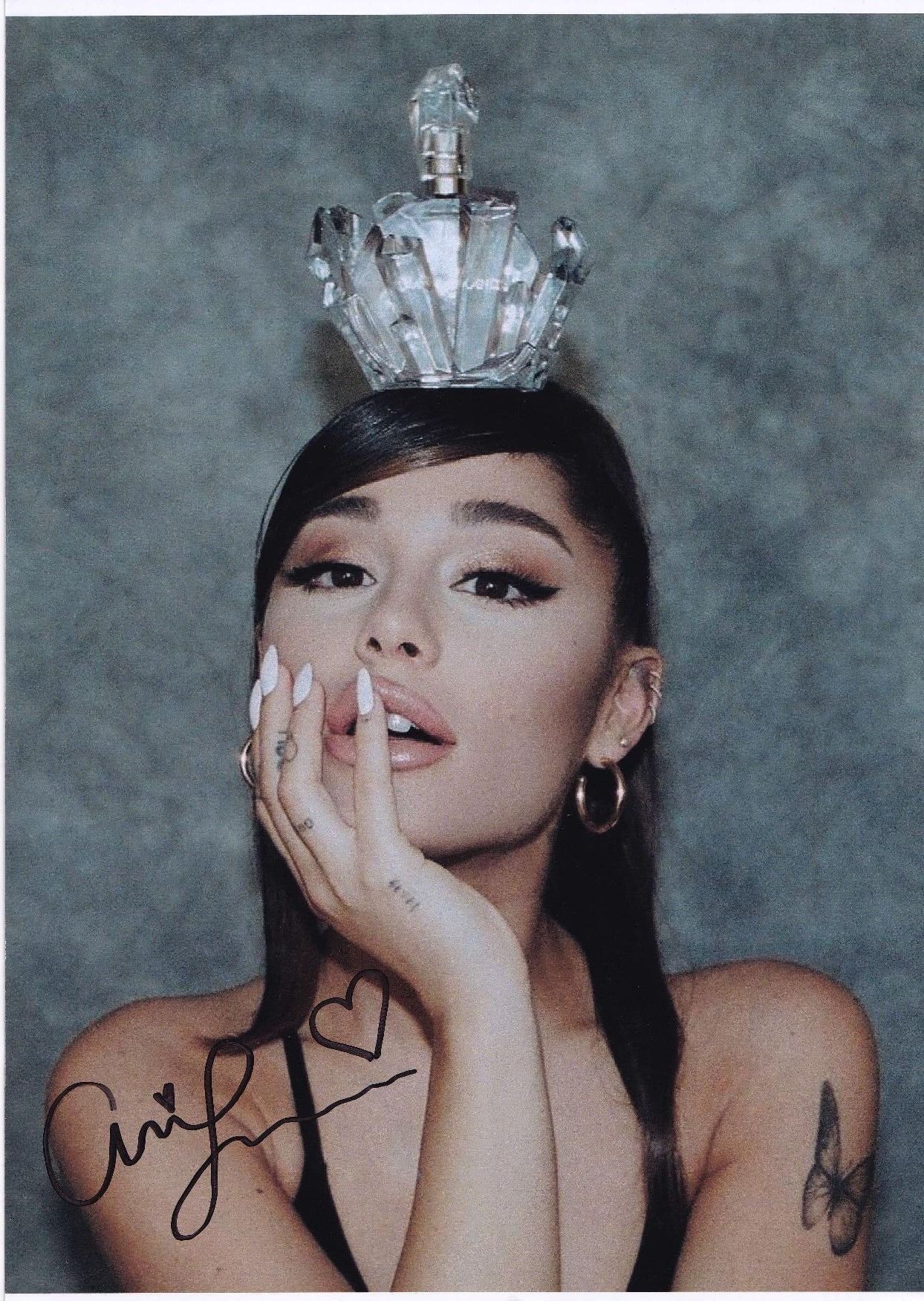 Ariana Grande signed photograph.