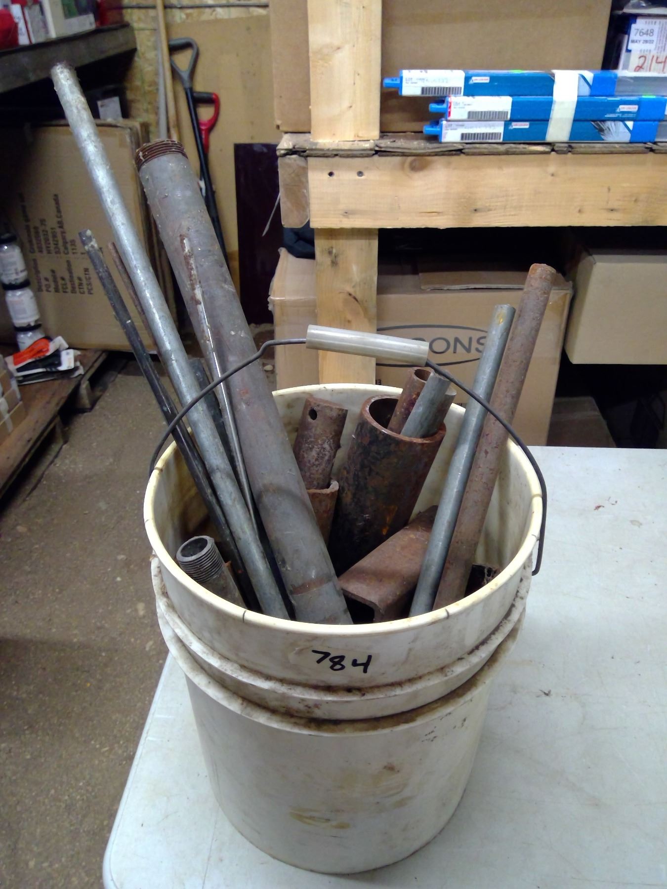 Bucket of Metal Pipes and Rods - Schmalz Auctions