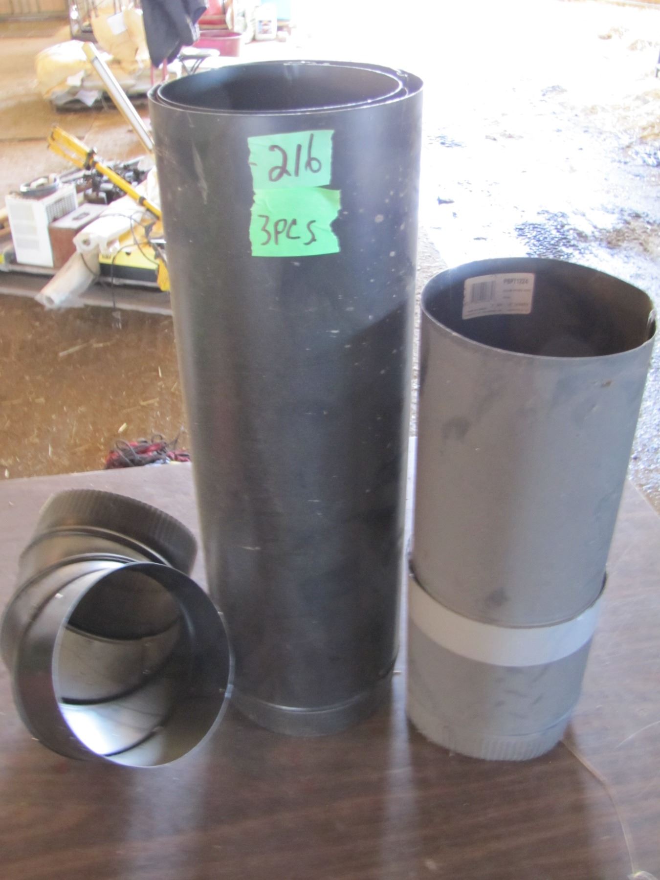 Lot of seven inch black stove pipe
