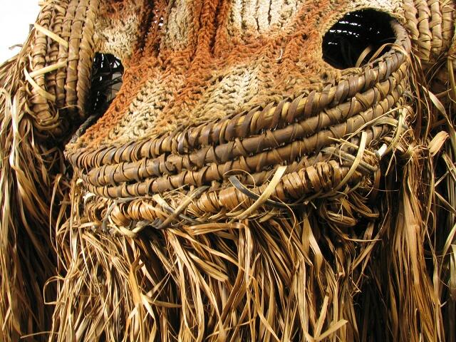 A FINE ASMAT DANCE COSTUME (jipaee), of woven cane and fibre with grass tas