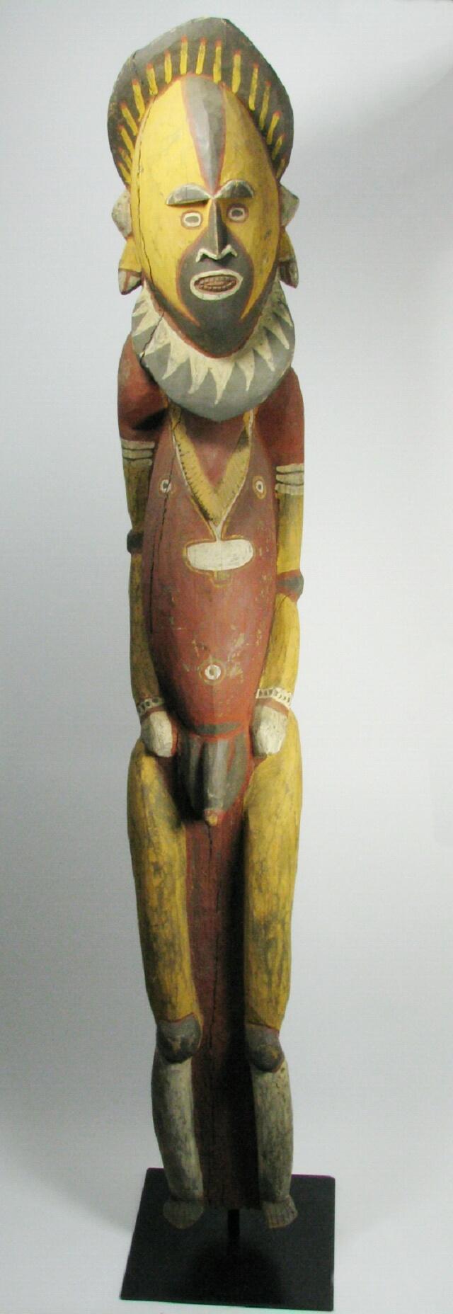 A MONUMENTAL WOSERA SCULPTURE, c.1960s, of wood sculpted in the classic for