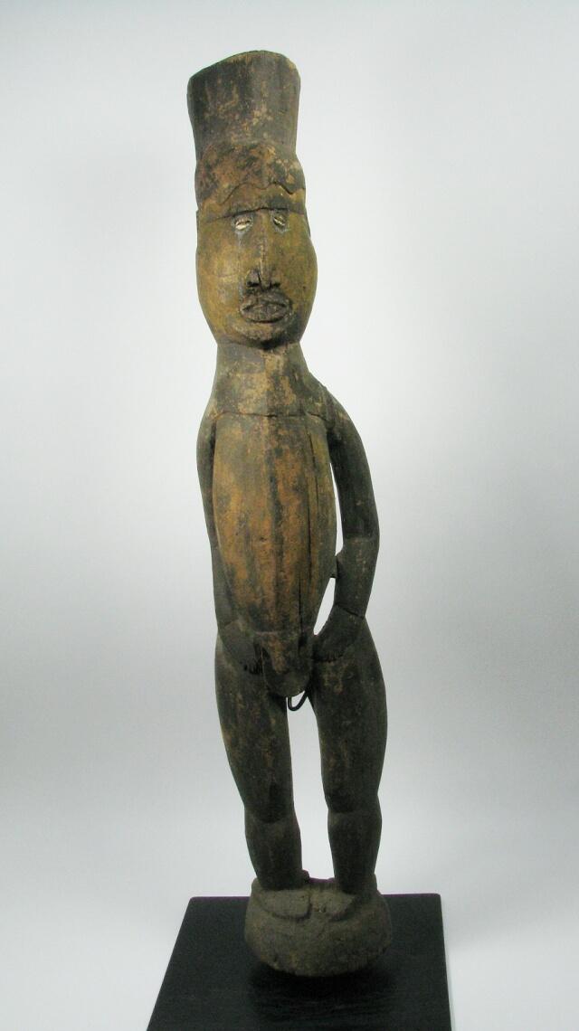 A CEREMONIAL WOSERA ANCESTOR SCULPTURE, of wood, in male form, decorated wi