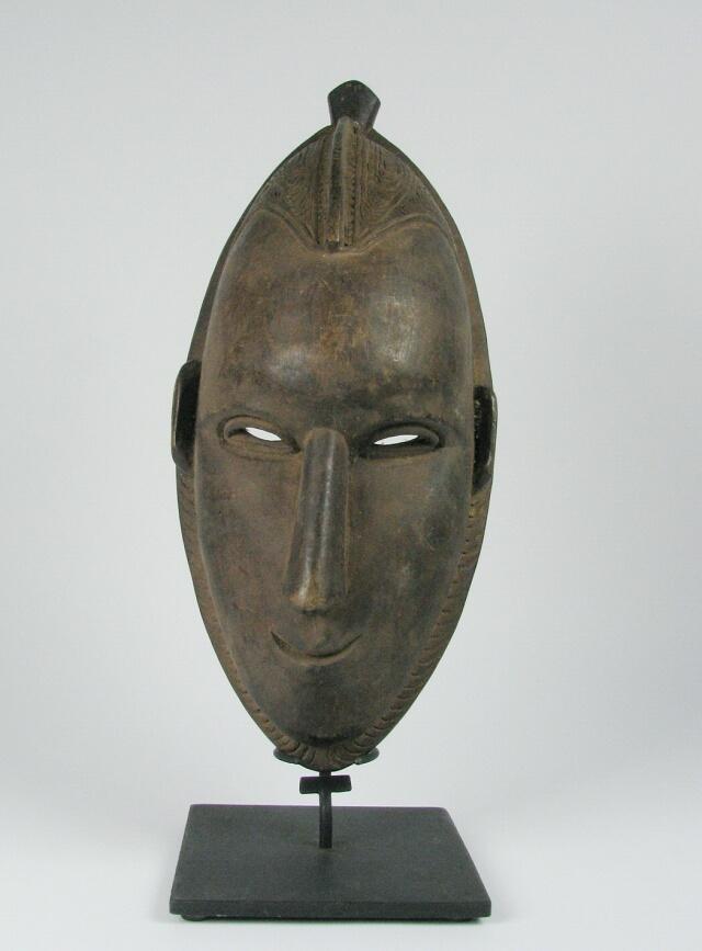 A FINE LOWER SEPIK ANCESTOR MASK (kamp), of wood, sculpted with fine featur