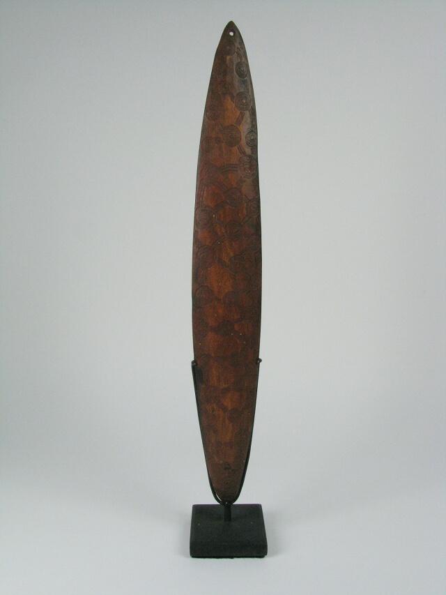 A FINE CENTRAL AUSTRALIAN CEREMONIAL BOARD, of wood in slender ovoid form d