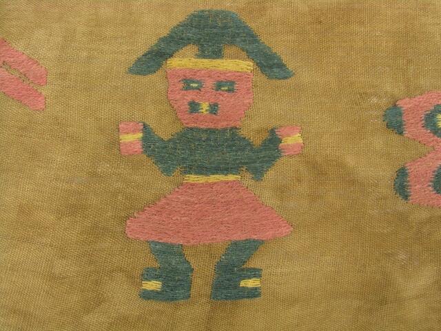 A PRE-COLUMBIAN TEXTILE FRAGMENT, Paracas Culture, of woven cotton embroide