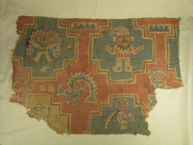 A PRE-COLUMBIAN TEXTILE FRAGMENT, Paracas Culture, of woven cotton embroide