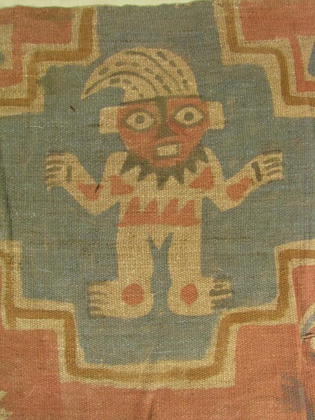 A PRE-COLUMBIAN TEXTILE FRAGMENT, Paracas Culture, of woven cotton embroide