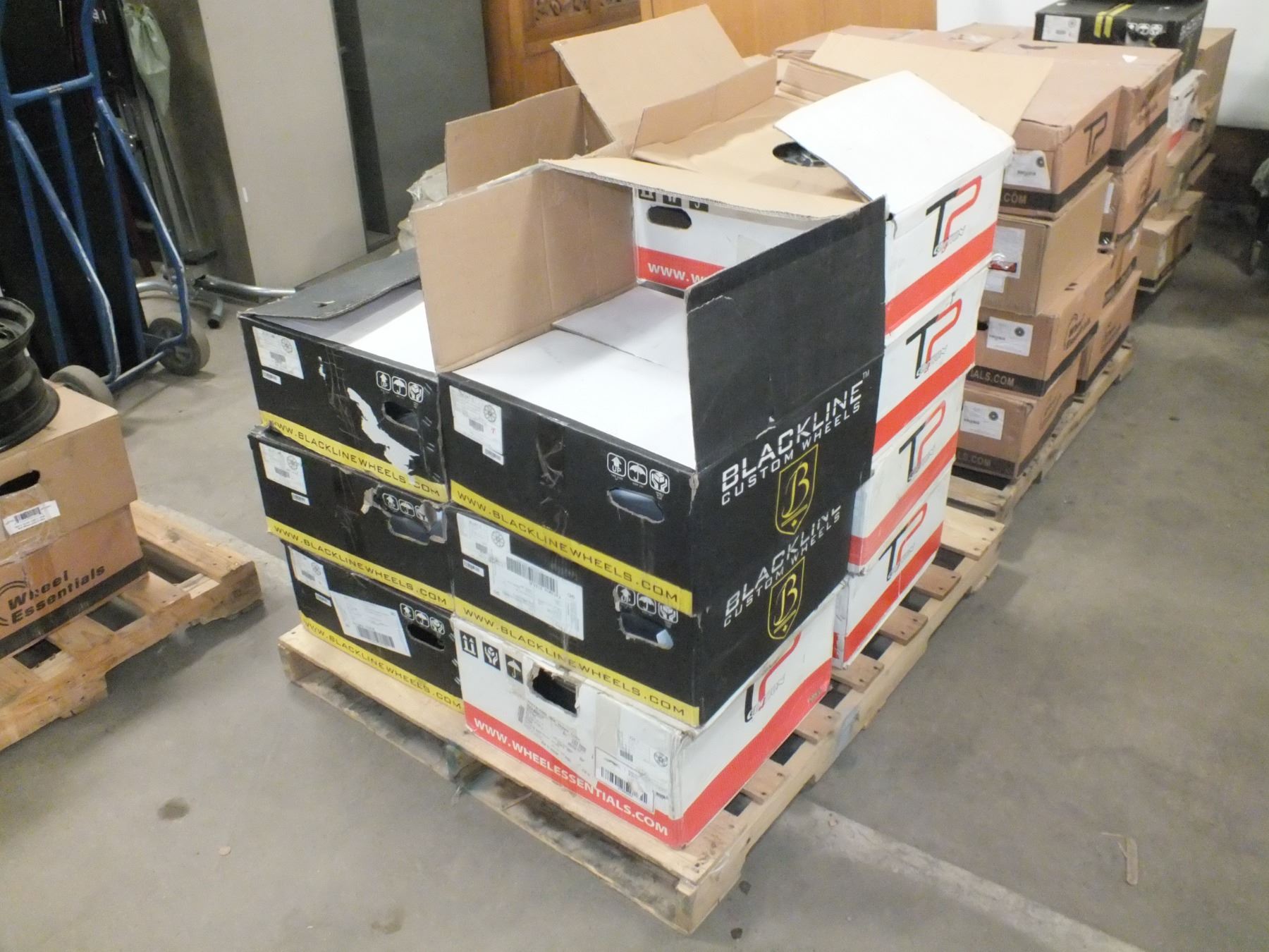 Pallet Of Black And Silver Aluminum Rims