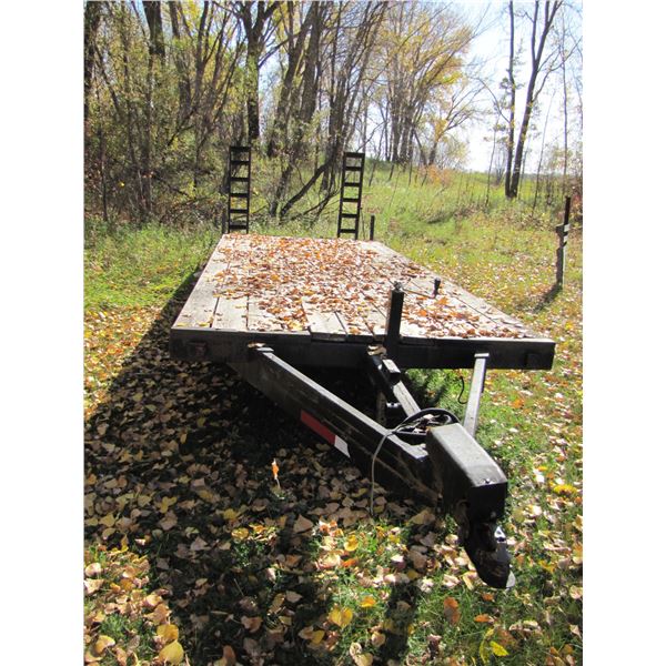 Tandem axle 16 foot flatbed trailer with beavertails ; new tires