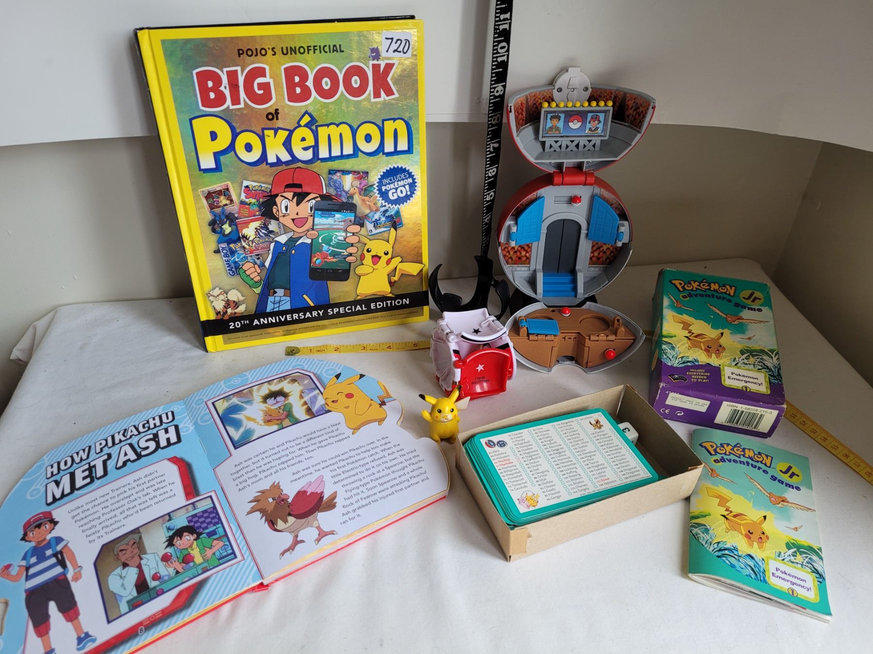 Pokemon books, game, Poke Ball & diarama.