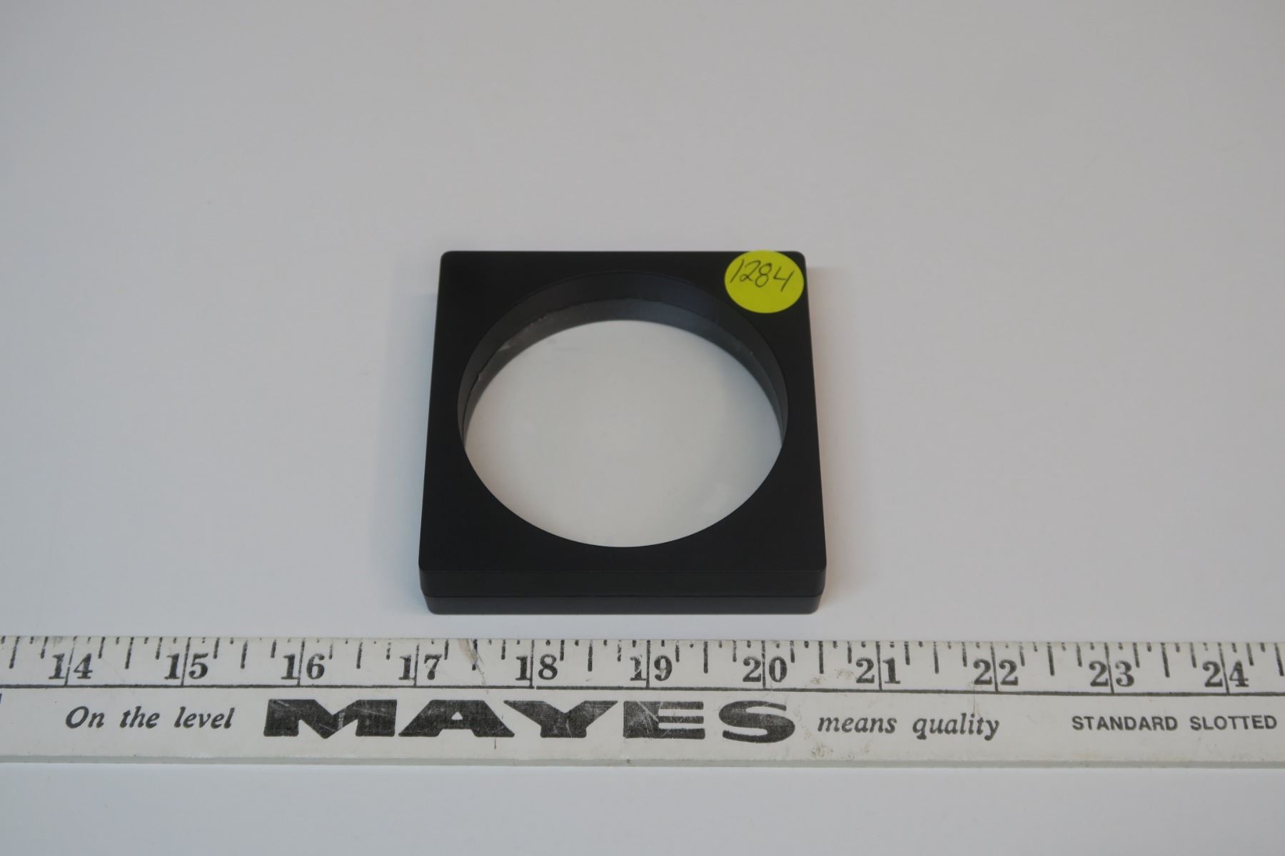 Hard Plastic Holder for housing a huge 3-inch medal. Used once.