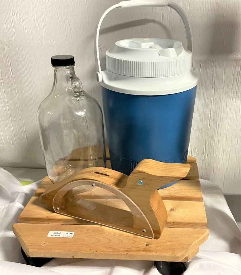 Carboy Dolly, Glass jug, Thermos and Coin bank