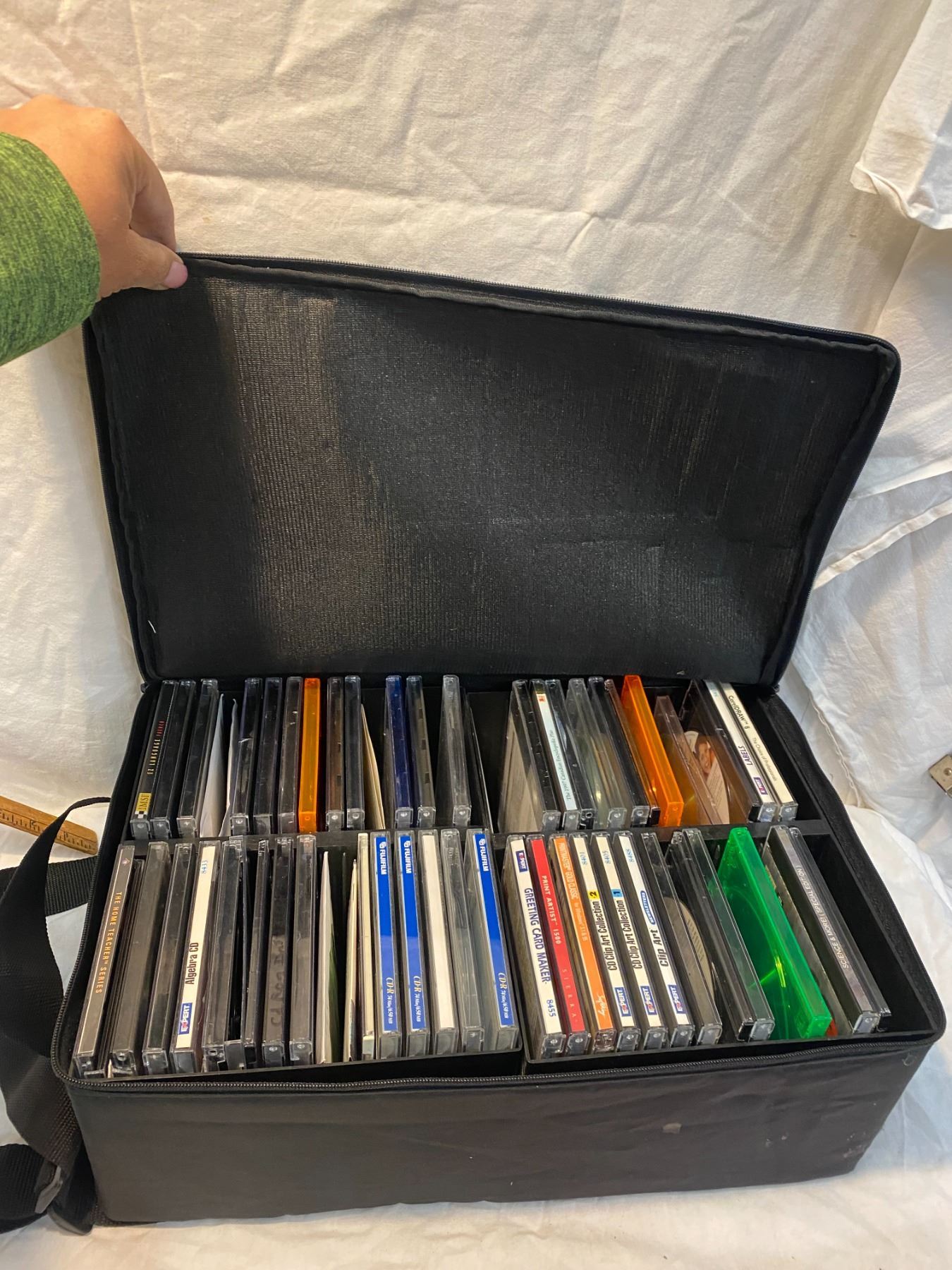 Cd case and assorted cds