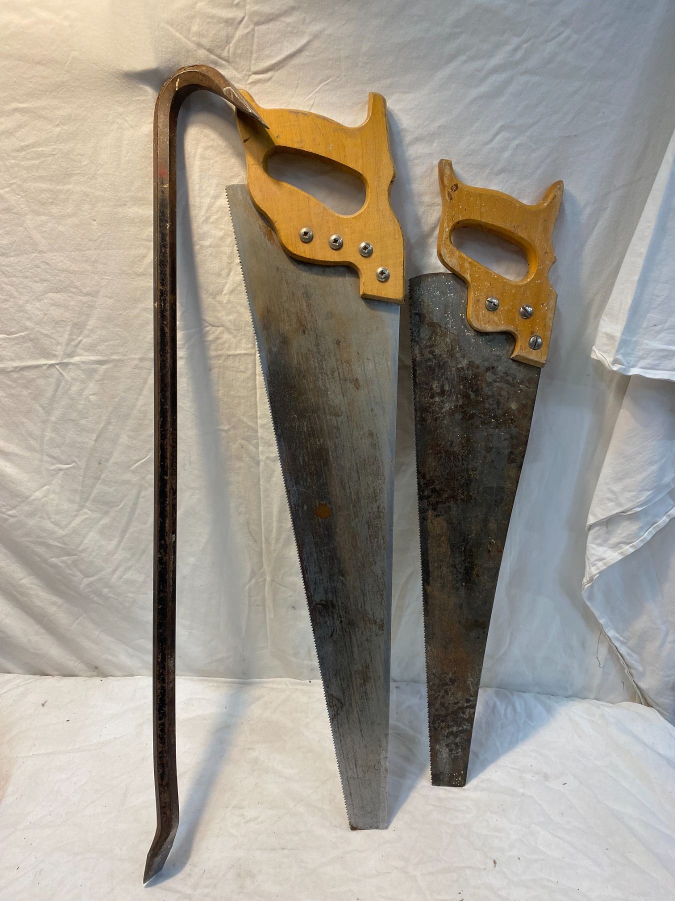 2 saws one crow bar