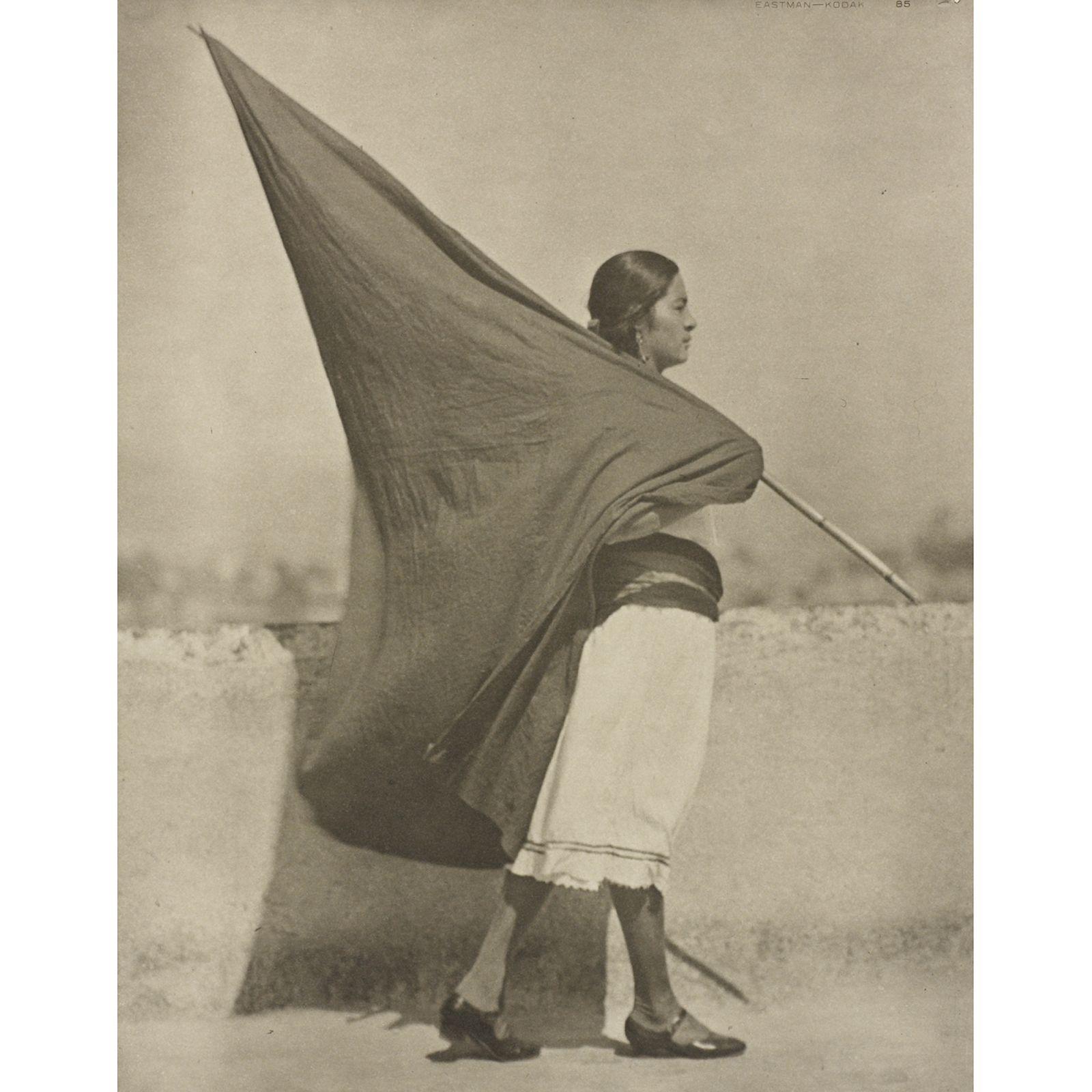 Tina Modotti untitled (woman with flag, Mexico)