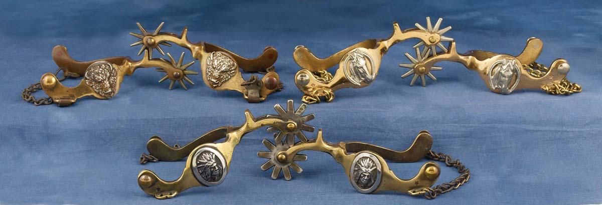 Three (3) Pair of Hercules Bronze Spurs (Buffalo, Indian & Horsehead)