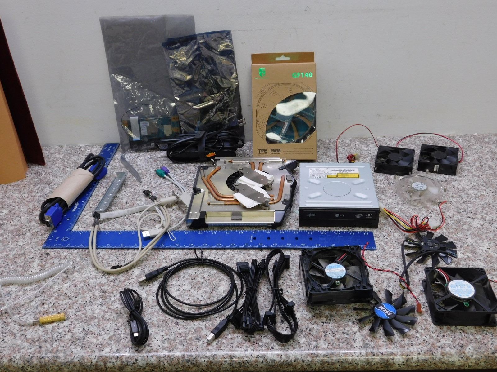 Box of Computer Parts Fans DVD Rewriter Cables Etc