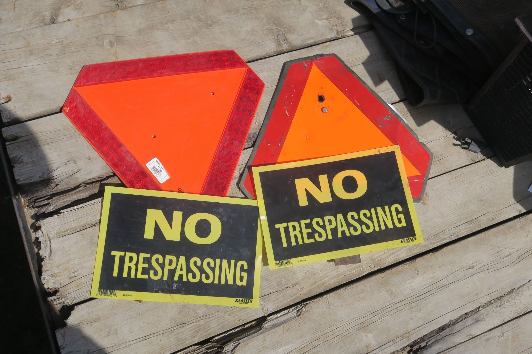 2 Slow Moving Signs, 2 No Trespassing Signs
