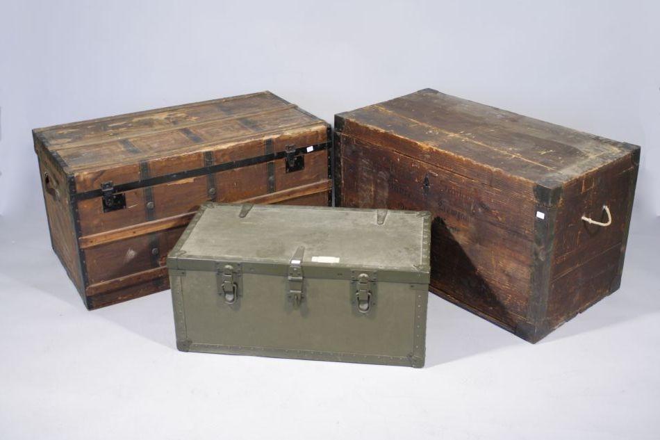 A Group of Three Wooden Trunks.