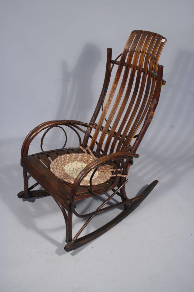 A Bent Willow Adirondack Style Rocking Chair.