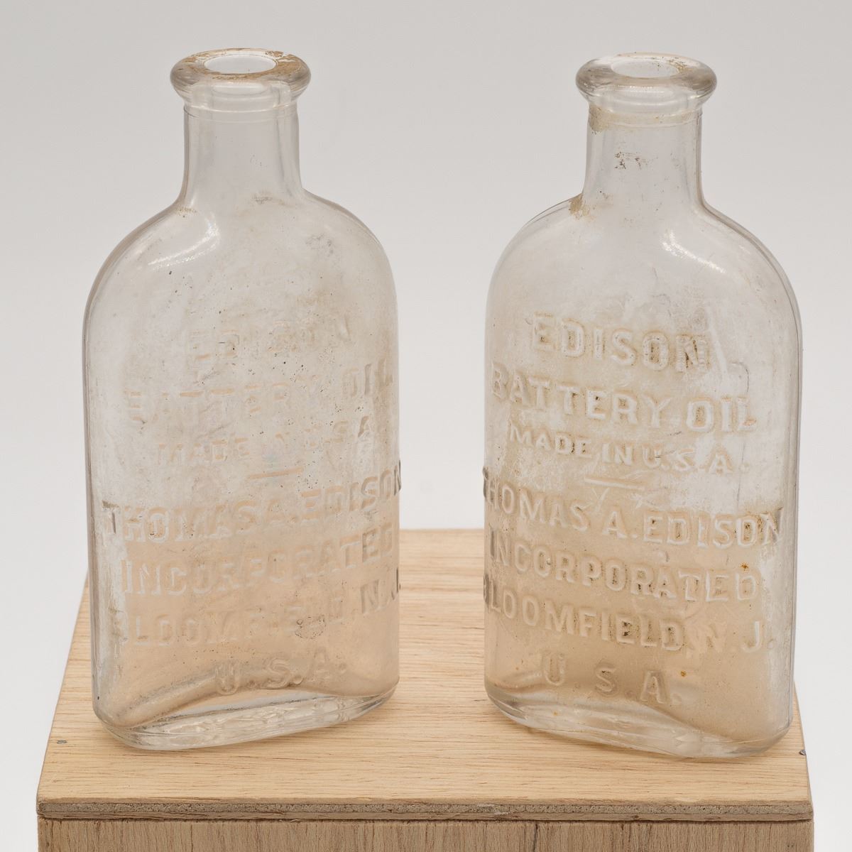 2 Antique Edison Battery Oil Glass Bottles